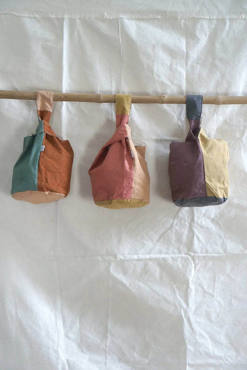 TRICOLOR KNOT POUCH – UNPLUG MOVEMENT SDN. BHD. (1306460-V)